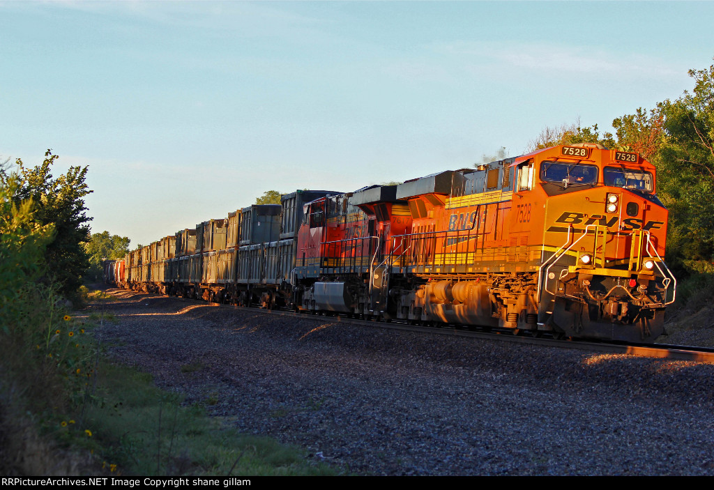 BNSF 7528 Pokes his head into the sunlight!